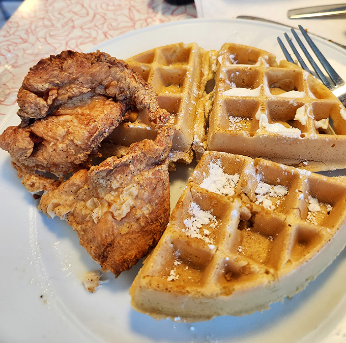 When fried chicken meets waffles, magic happens, and powdered sugar makes everything better, as it always does in life.