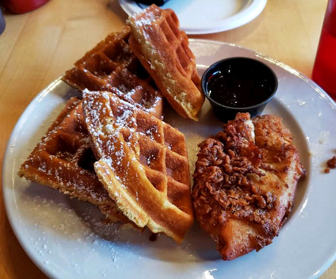 Chicken and waffles: where crispy, golden Belgian-style waffles meet perfectly fried chicken in a breakfast-dinner mashup that defies time itself.