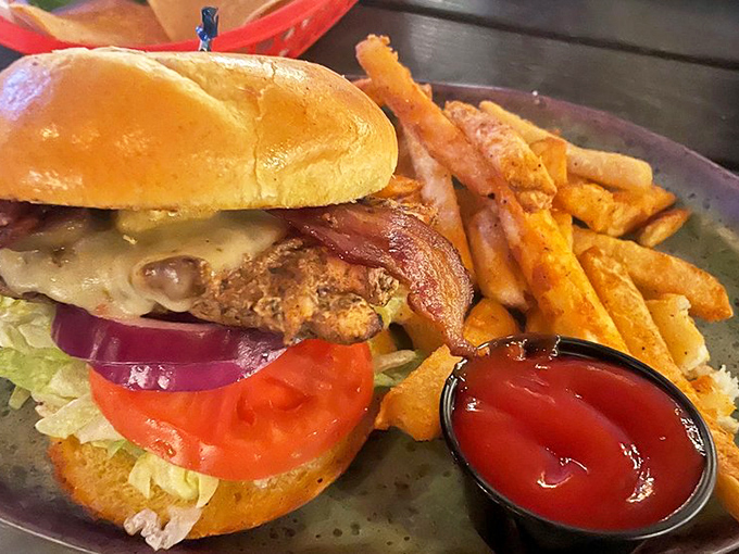 This isn't just a sandwich; it's architecture. The perfect stack of crispy chicken, melty cheese, and fresh veggies demands both admiration and immediate consumption.