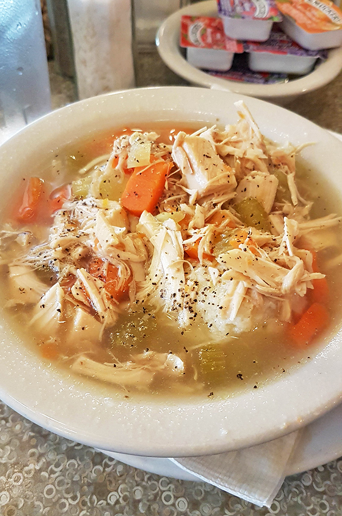 Chicken soup that could heal not just colds but existential crises &ndash; chunky, aromatic, and made with grandmotherly precision.