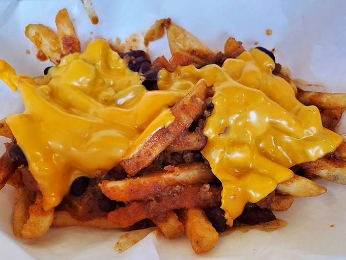 Cheese fries that don't apologize for being exactly what they are: a glorious, molten celebration of America's favorite side dish.