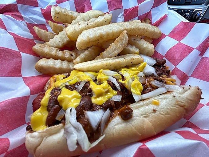 This isn't just a chili dog&mdash;it's a masterclass in American street food, where beef, cheese, onions, and bun achieve perfect harmony in every messy bite.