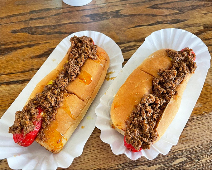 Two chili dogs that would make even the most sophisticated food critic abandon their vocabulary and simply say "wow."