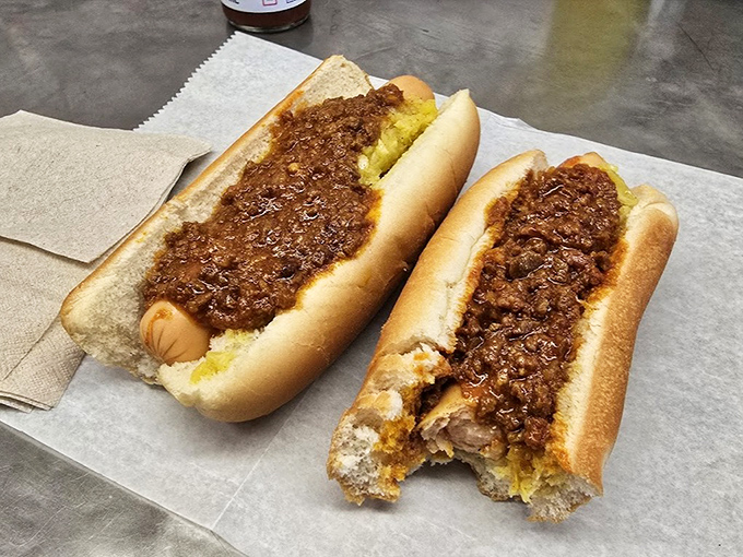 The chile dogs&mdash;notice that special spelling&mdash;come smothered in the tavern's legendary meat sauce, a symphony of savory goodness in every bite.