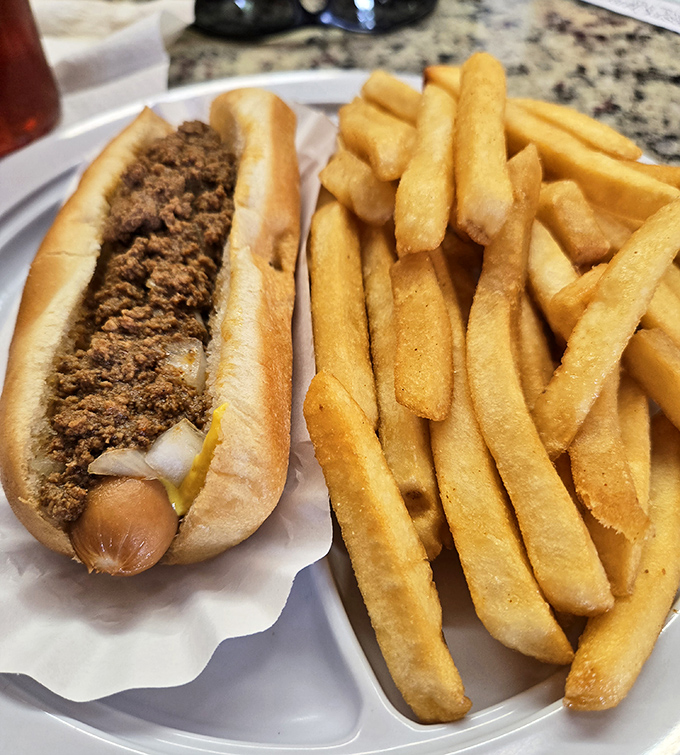 The chili dog at Mac's doesn't need fancy toppings to impress&mdash;just perfectly seasoned meat, a soft bun, and the confidence that comes from decades of practice.