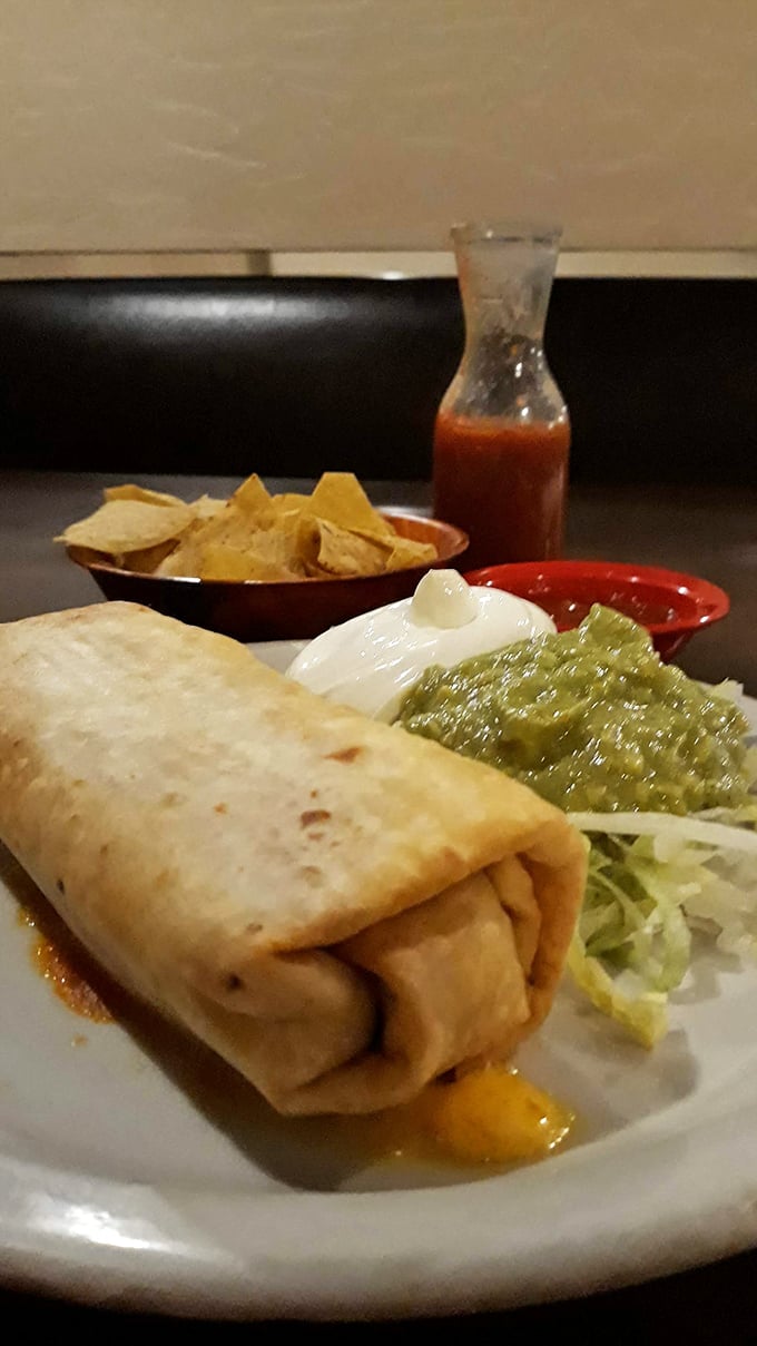 This chimichanga isn't just fried&mdash;it's transformed into a golden-brown masterpiece that makes calorie counting seem like a crime.