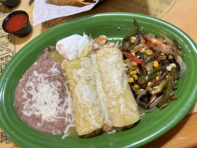 Green enchiladas nestled beside perfectly executed rice and beans&mdash;proof that even in a seafood joint, the Mexican classics get the respect they deserve.