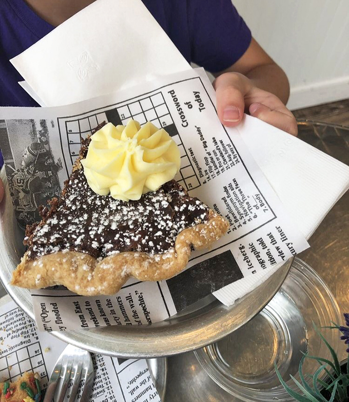 Chocolate ganache topped with whipped cream perfection, because sometimes dessert needs to be the main event instead.