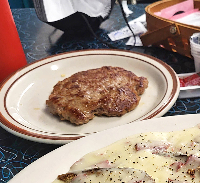A perfectly seared chopped sirloin that doesn't need fancy plating to tell you it's delicious. This is meat and potatoes that means business.