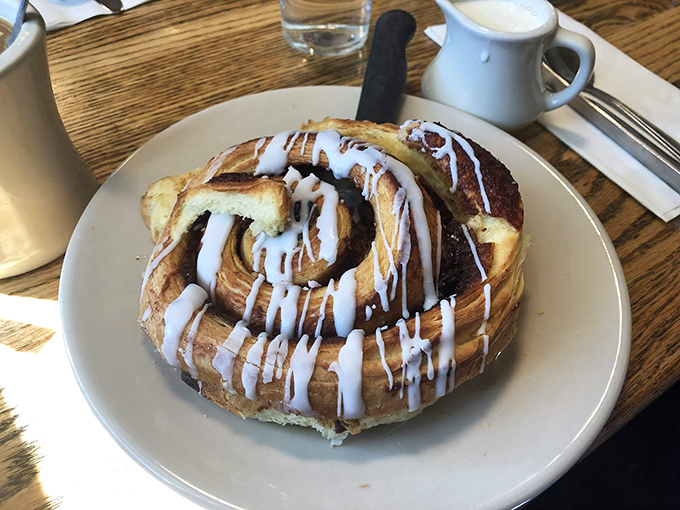 Not just a cinnamon roll, but a spiral-shaped love letter to morning indulgence, complete with that irresistible vanilla glaze drizzle.