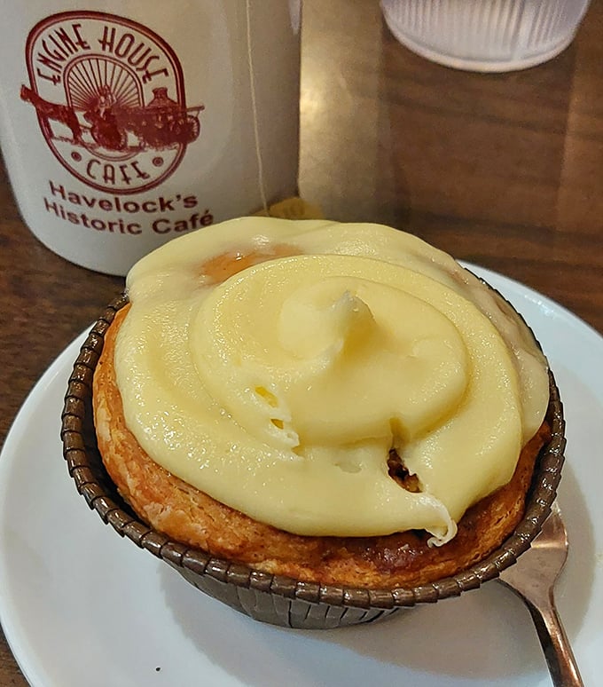 That cinnamon roll could double as a flotation device, drowning gloriously in enough icing to justify every calorie consumed.