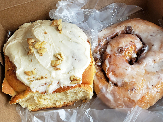 That cinnamon roll isn't just breakfast &ndash; it's an edible hug with walnut accessories. The glazed donut beside it is just showing off.