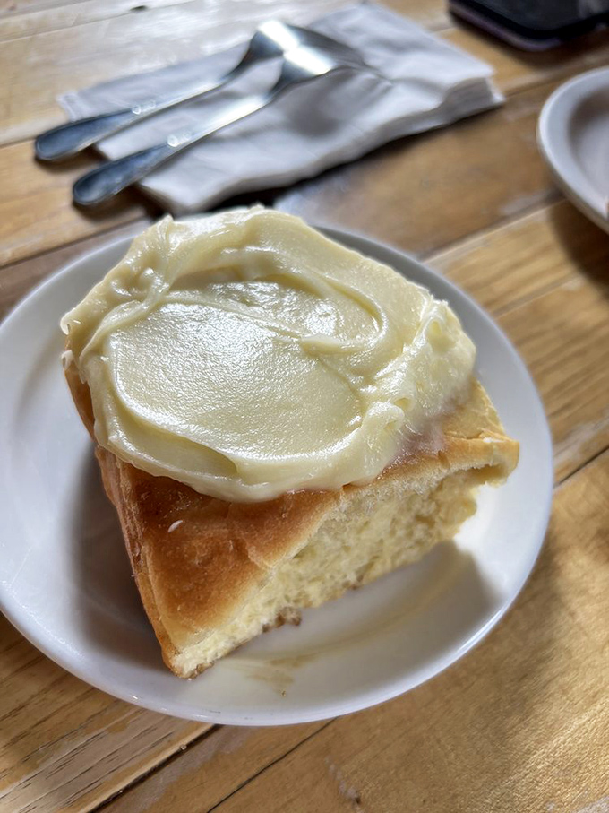 Cream cheese frosting melts languidly over a cinnamon roll that clearly didn't skip any butter in pastry school. Worth every delicious calorie.