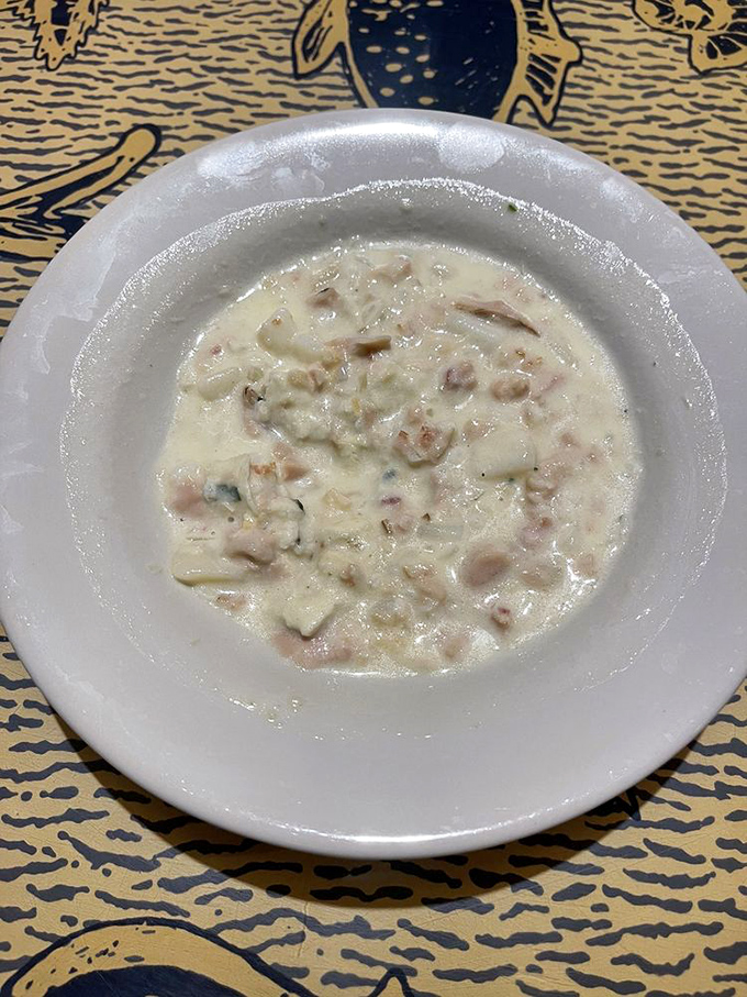 This isn't just clam chowder; it's a creamy ocean symphony in a bowl, with each spoonful delivering waves of comfort.