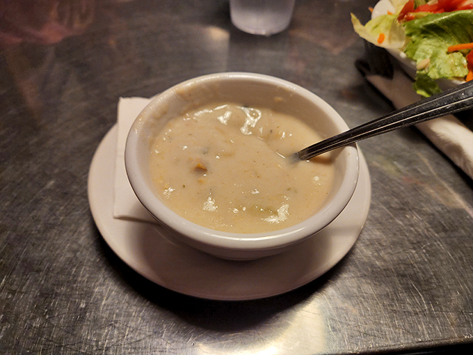 This isn't just clam chowder; it's a creamy hug in a bowl that makes you wonder why you'd ever settle for the stuff from a can.