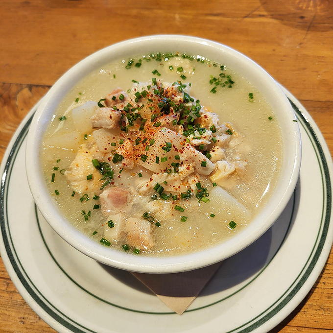 Clear chowder that lets the clams do the talking. This bowl of brothy perfection would make a Rhode Islander stand up and salute.