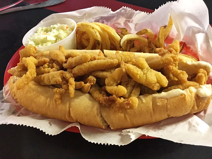 The clam roll arrives like a treasure chest overflowing with golden fried bounty. That toasted bun barely contains its delicious cargo&mdash;the coleslaw stands ready for backup.