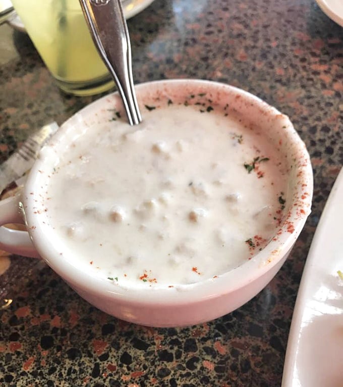 Creamy, soul-warming chowder arrives like a hug in a bowl, dotted with tender clams and just the right spices.