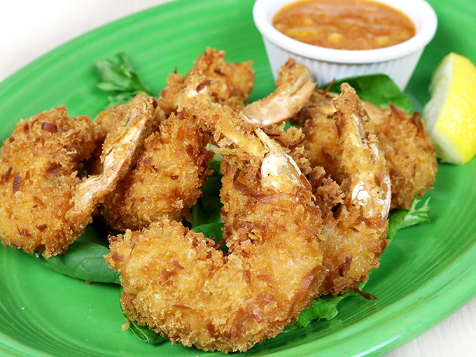 Golden, crispy, and begging to be dipped &ndash; coconut shrimp that would make any beachside restaurant jealous.