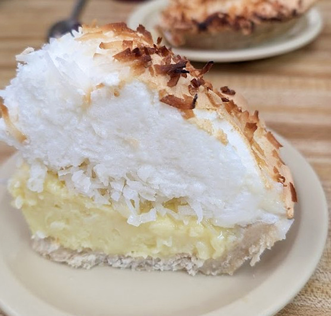 This coconut cream pie doesn't just end a meal - it's the grand finale that makes you wonder if you should have skipped straight to dessert.