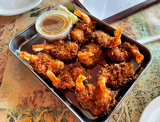 Coconut shrimp that crunch like autumn leaves—only these leaves are dipped in sweet chili sauce and make you say "wow."
