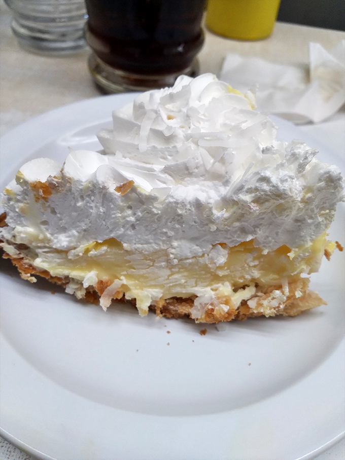 Sweet endings after savory beginnings. This cloud-like slice of coconut cream pie offers the perfect counterbalance to Coney indulgence. 