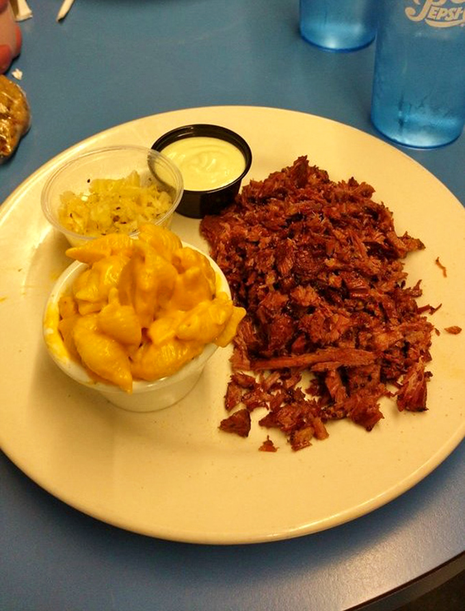 This isn't just pulled pork&mdash;it's a masterclass in smoke and patience, served alongside mac and cheese that could make a Southerner weep.