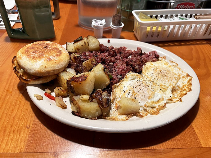Hearty corned beef hash with eggs and potatoes - the breakfast equivalent of a warm hug from your favorite aunt.