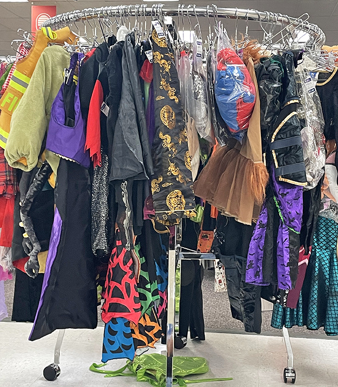 Halloween enthusiasts and costume party procrastinators, your salvation hangs right here on convenient rolling racks.