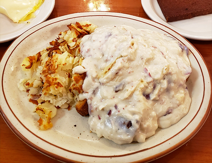 Country fried steak smothered in gravy - comfort food that gives actual comfort, not just empty promises.