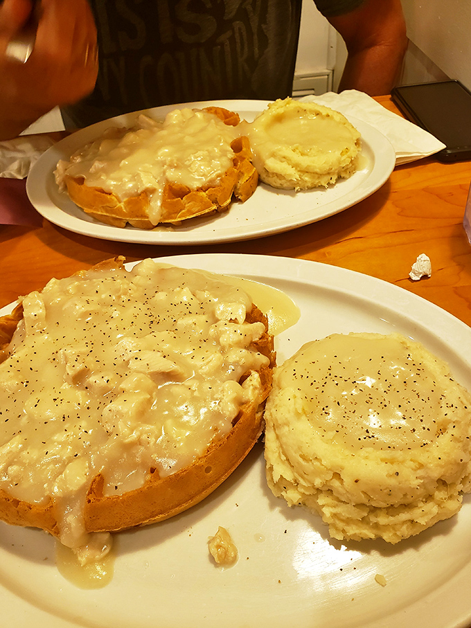 Chicken fried steak smothered in gravy with a side of mashed potatoes&mdash;comfort food that hugs your soul from the inside.