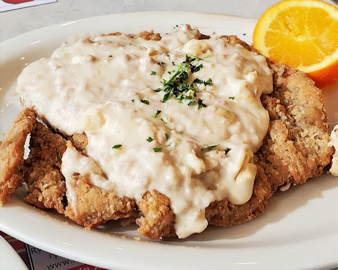 Country fried steak with gravy so good you'll want to write home about it&mdash;if you can put your fork down long enough. 