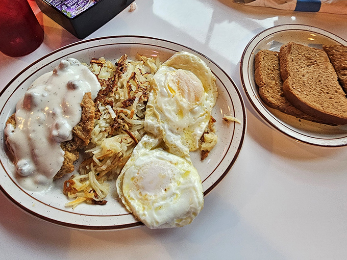 Breakfast served with a side of nostalgia&mdash;eggs sunny-side up, crispy hash browns, and country gravy that would make your grandmother nod in approval.