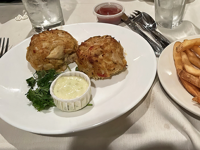 Maryland crab cakes that are actually crab, not breadcrumbs with a seafood rumor—served with a side of "why don't I come here more often?"