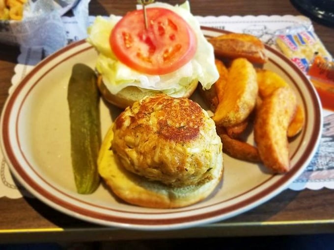 The humble sandwich elevated to art form. This crab cake creation comes with potato wedges that look like they've been working out at the gym.