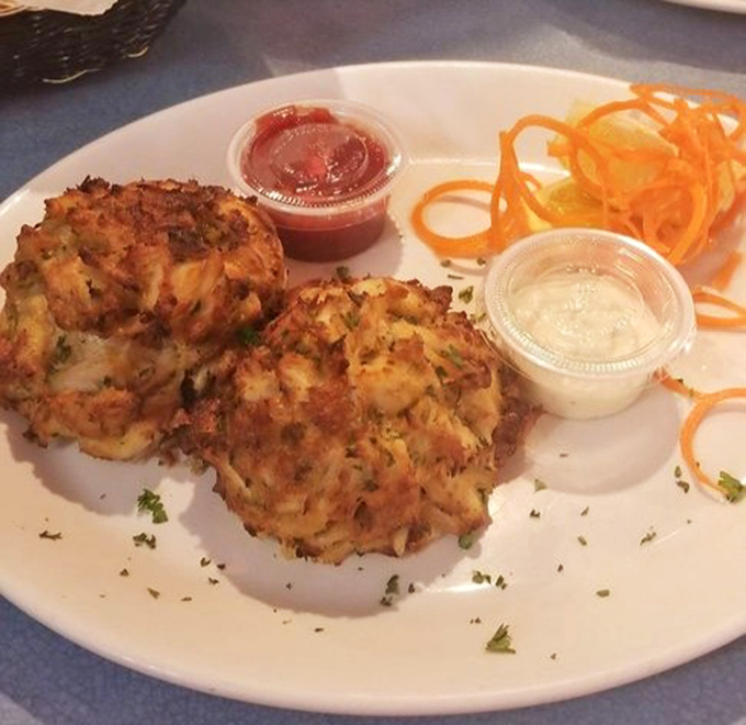 Maryland's famous crab cakes &ndash; golden-brown on the outside, succulent inside &ndash; served with a side of local pride and zero pretension.