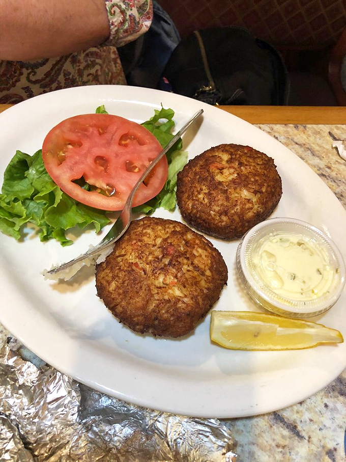 Golden-brown crab cakes that don't hide behind fillers&mdash;just pure, sweet crabmeat with a crispy exterior that shatters with each bite.