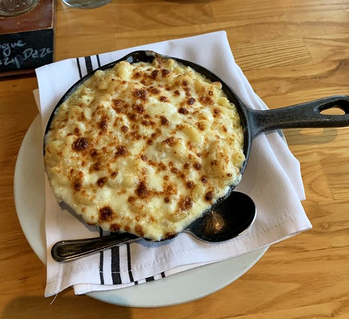 Cast iron comfort meets coastal sophistication in this bubbling masterpiece of indulgent marine decadence.