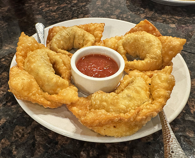 Golden-fried pockets of deliciousness that shatter with each bite. These crispy treasures make you wonder why you ever settled for ordinary appetizers.