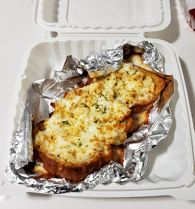 Cheesy, gooey, crab-topped perfection in a takeout container. Some treasures don't need fancy presentation to make your taste buds stand at attention.