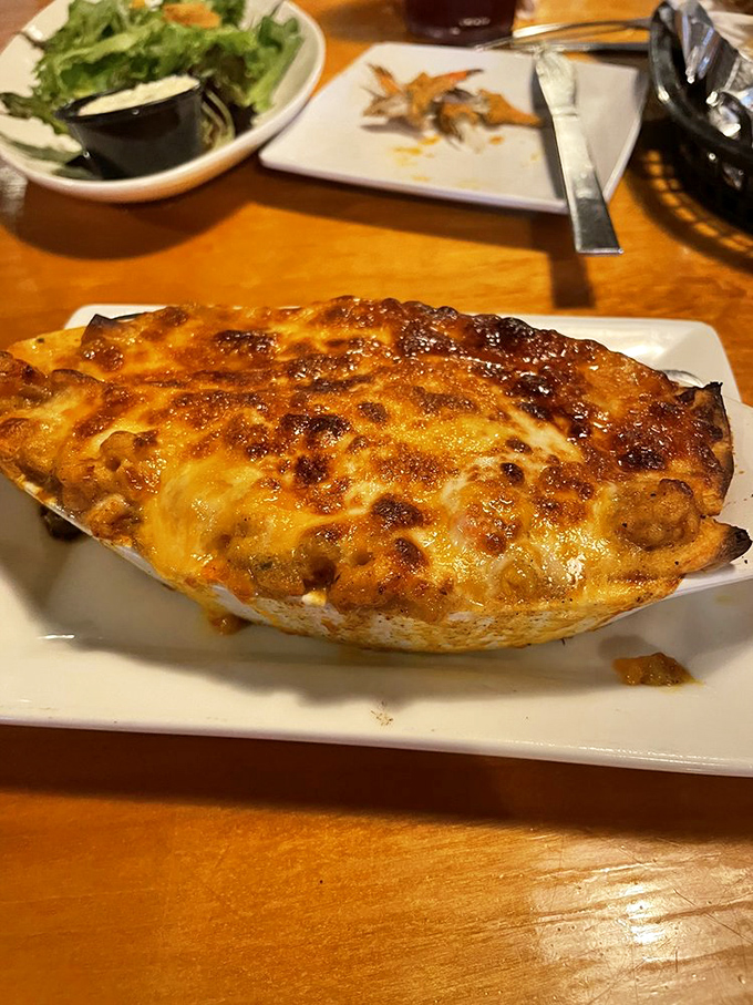 Cheese-crusted seafood perfection that makes you wonder why anyone would ever eat anything else. Diet starts tomorrow.