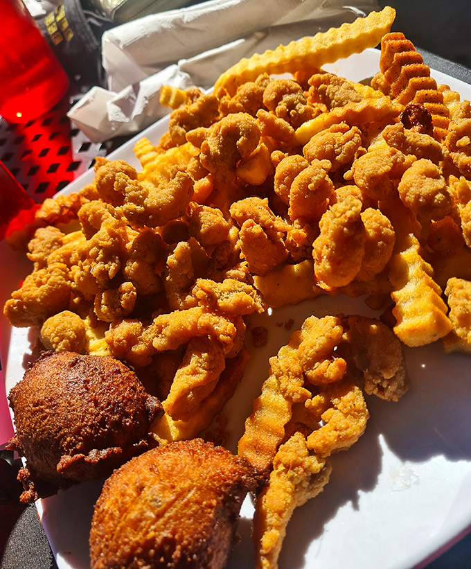 Golden fried crawfish tails piled high enough to make you question whether sharing is really all that virtuous.
