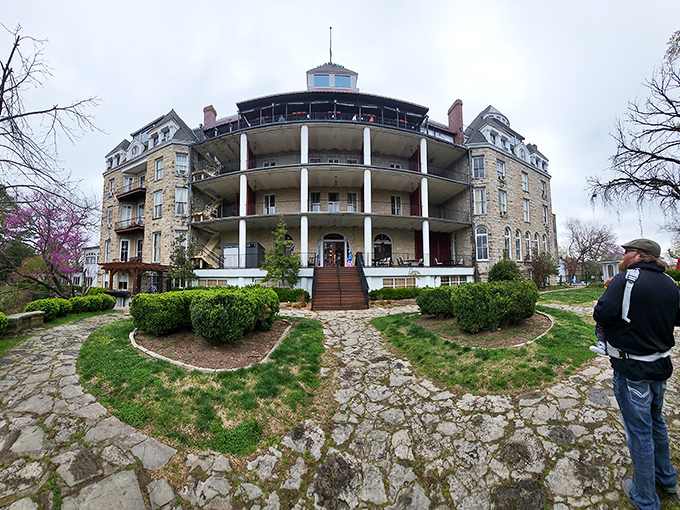 The Crescent Hotel stands majestically on the hillside, its stone facade hiding 135 years of stories—some more spine-tingling than others.