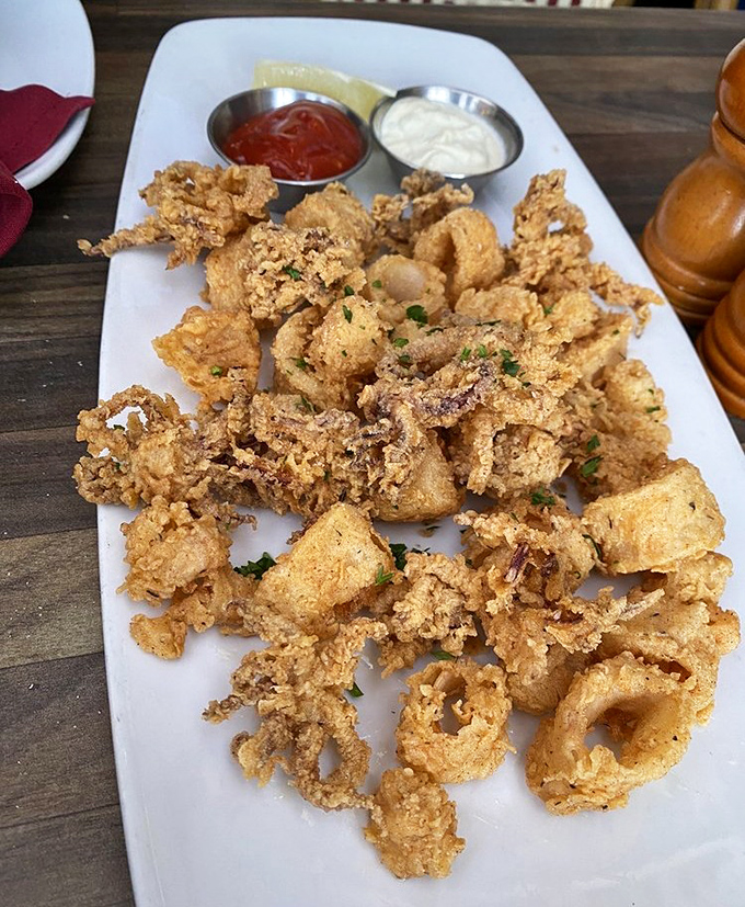 Calamari so perfectly crisp it makes that disappointing rubbery airport version seem like it came from a different ocean entirely.