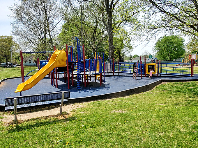 Cunningham Park's wide paths invite leisurely strolls where nobody's training for anything except maybe a good nap.