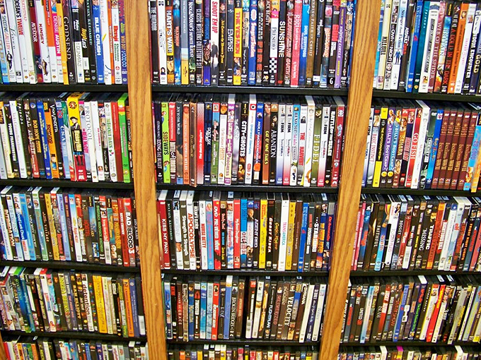 A cinematic time capsule where forgotten blockbusters and cult classics share shelf space, waiting for movie night resurrection.