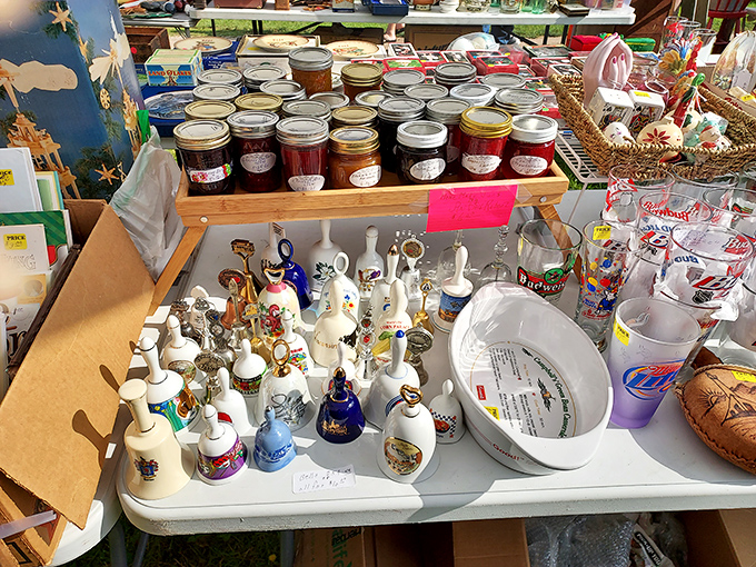 A congregation of collectible bells and vintage glassware stands ready to join your curio cabinet. Your grandmother would absolutely approve.