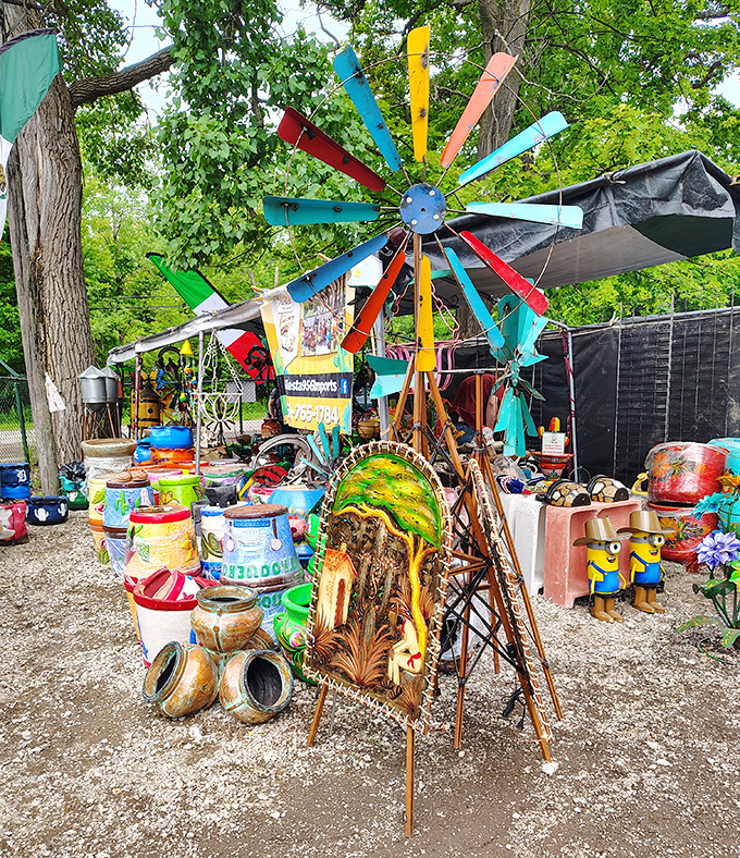 This whimsical windmill display proves one person's garden decoration is another's conversation piece. Folk art meets yard art!