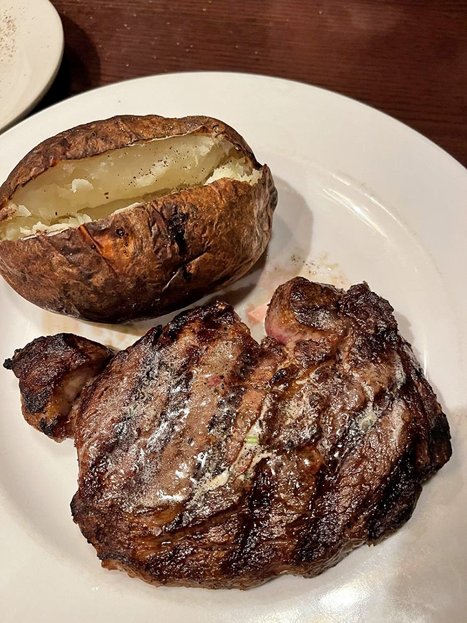 This baked potato looks like it's been working out at the gym, while the steak delivers the kind of flavor that makes you understand why humans domesticated cattle.