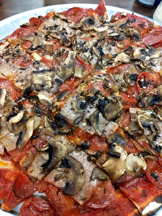 Mushroom lovers, rejoice! This fungi-pepperoni masterpiece proves that sometimes more is more, especially when it comes to toppings.